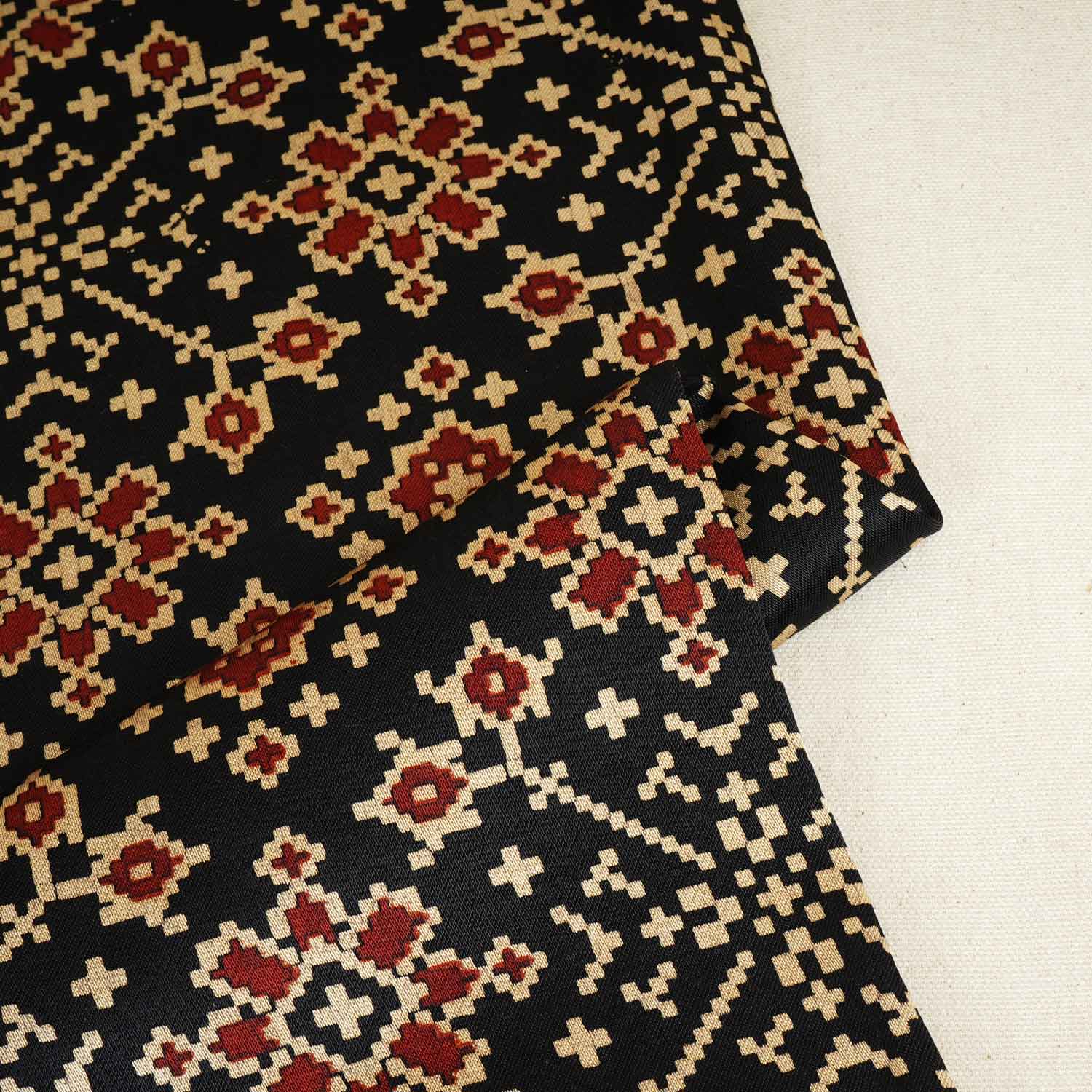 Buy Black Ajrakh Print Mashru Silk Fabric at TradeUNO – TradeUNO Fabrics