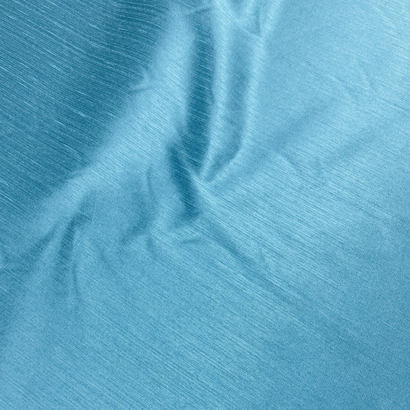 Buy Emerald Green Solid Silk Tafetta Fabric Online – TradeUNO Fabrics