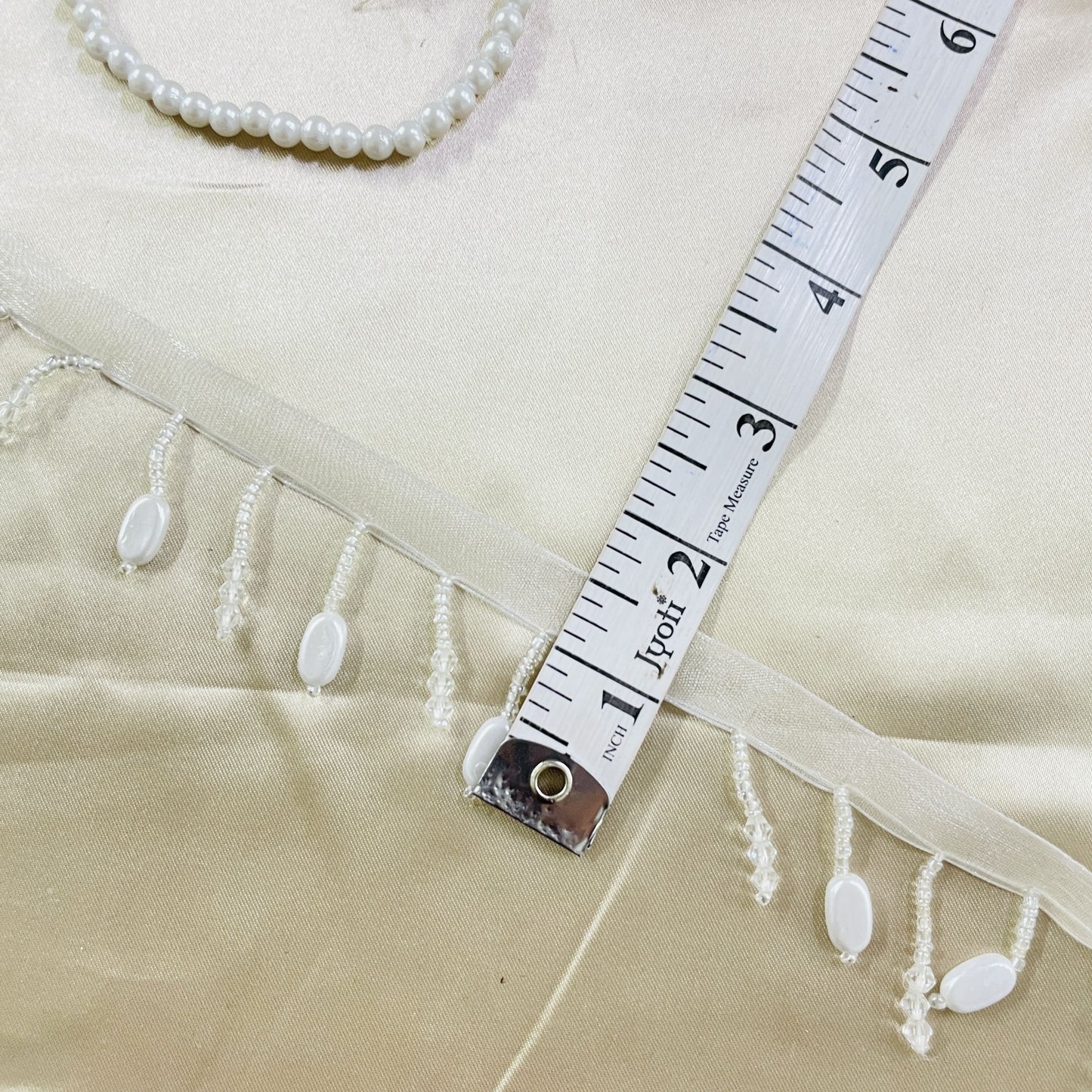 Buy White Pearl CutDana Hanging Lace Online at TradeUNO – TradeUNO Fabrics